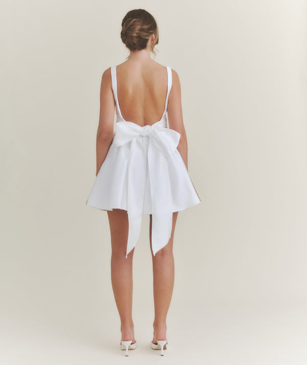Satin Bow Back Pleated Skirt Mini Dress - White – Six Stories